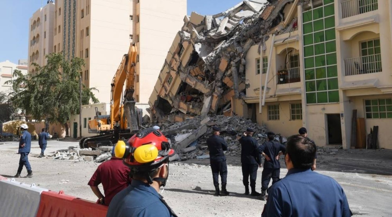Authorities launch probe into Central Doha building collapse death ...