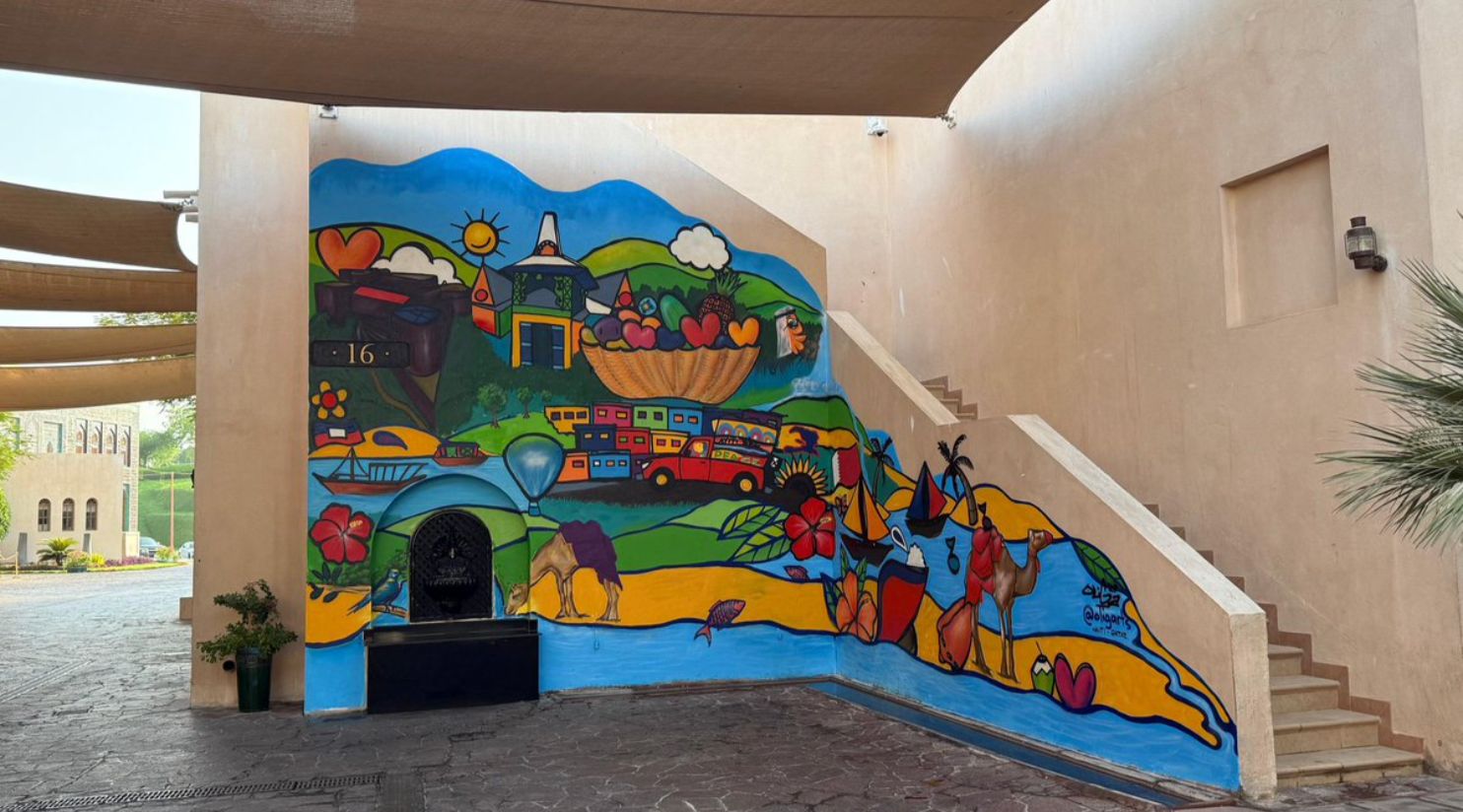 Qatari, Haitian cultures join hands on a mural in Katara | Qatar Living